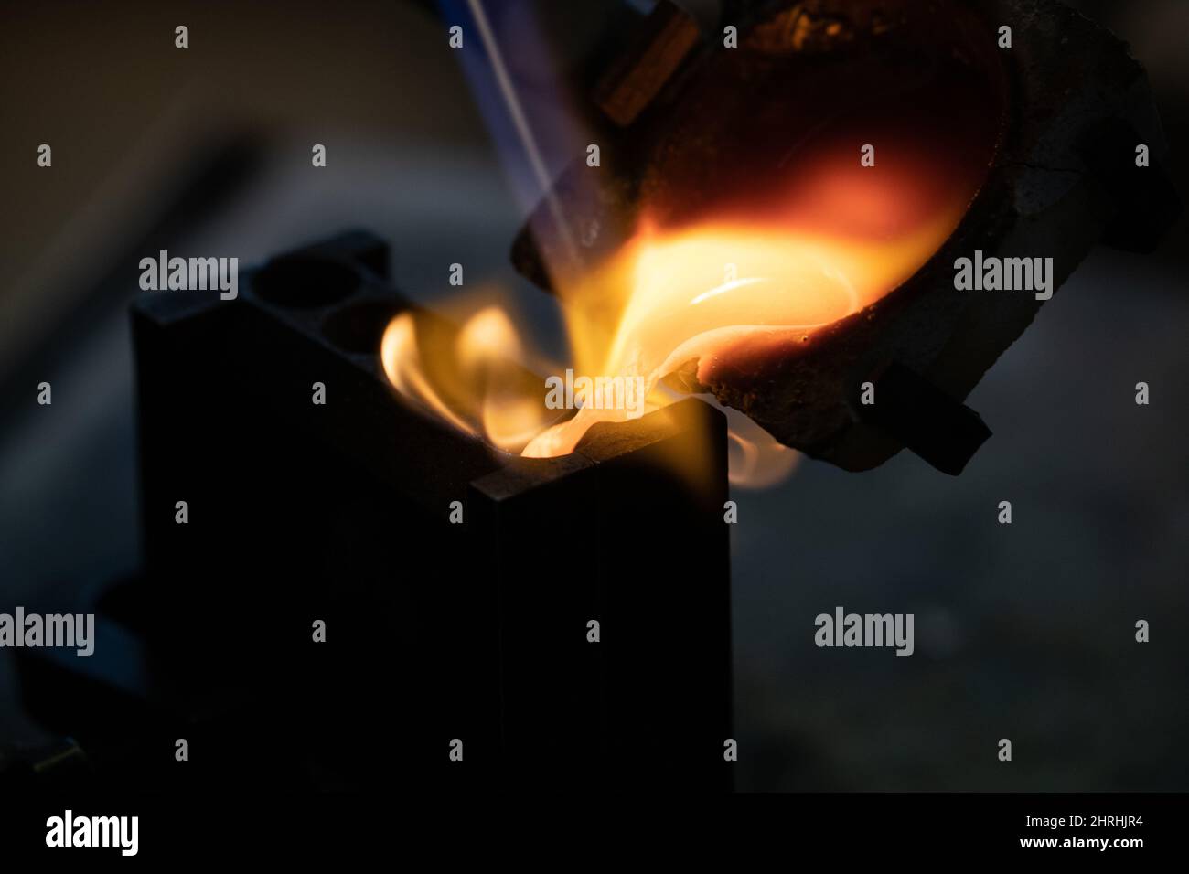 Closeup of hot melted metal in a rusty container in a factory Stock ...
