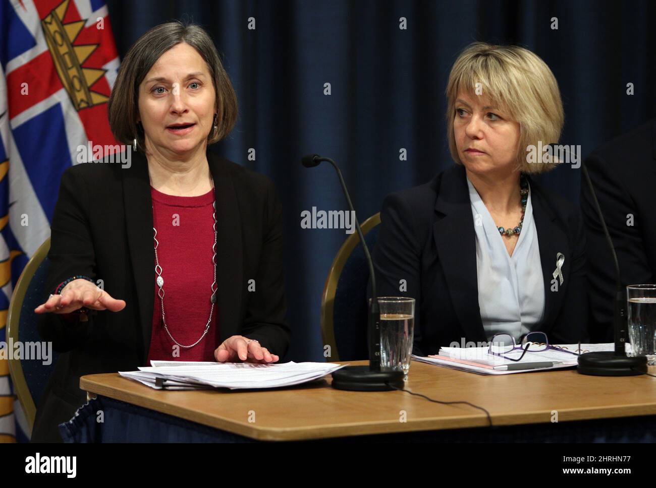 Chief coroner Lisa Lapointe (left) speaks as provincial health officer ...