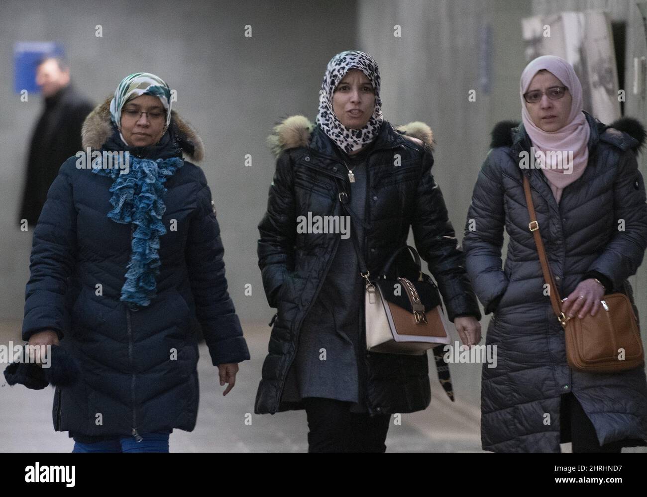 Members of the Muslim community arrive to hear the judge's sentencing ...