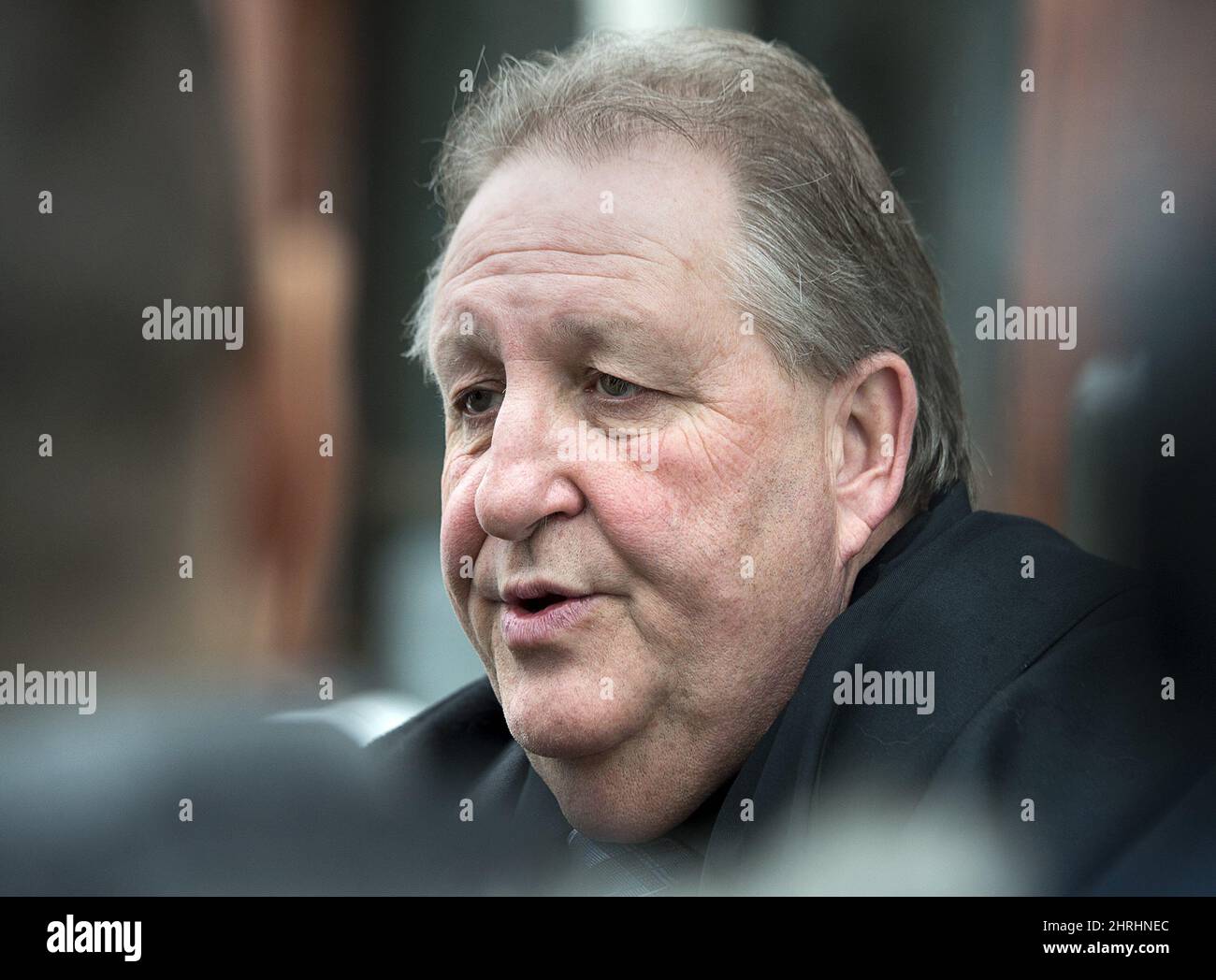 Lawyer Gilles Lemieux, representing Matthew Vincent Raymond, talks with ...