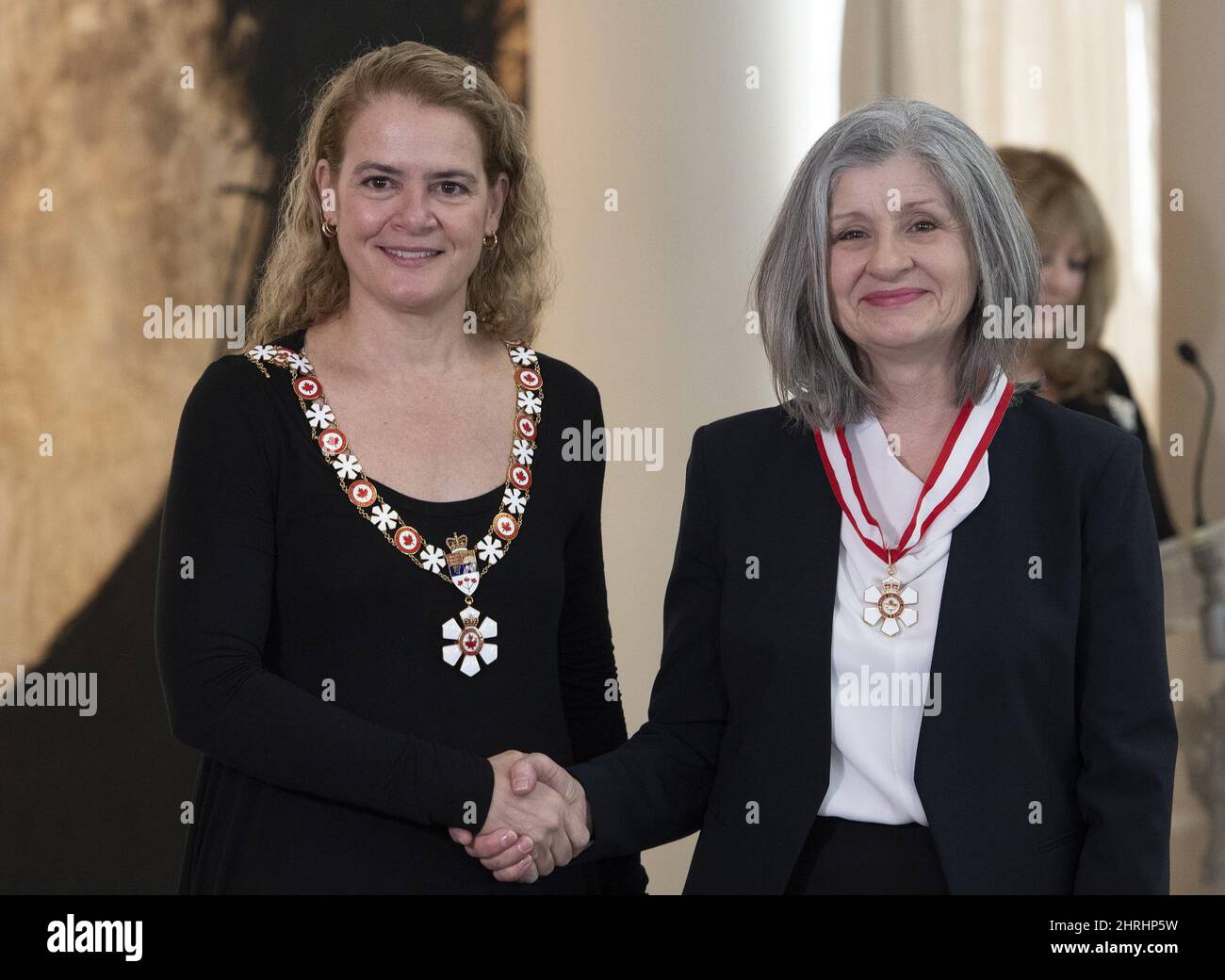Governor General Julie Payette, left, invests Christiane Ayotte into the Order of Canada during ...