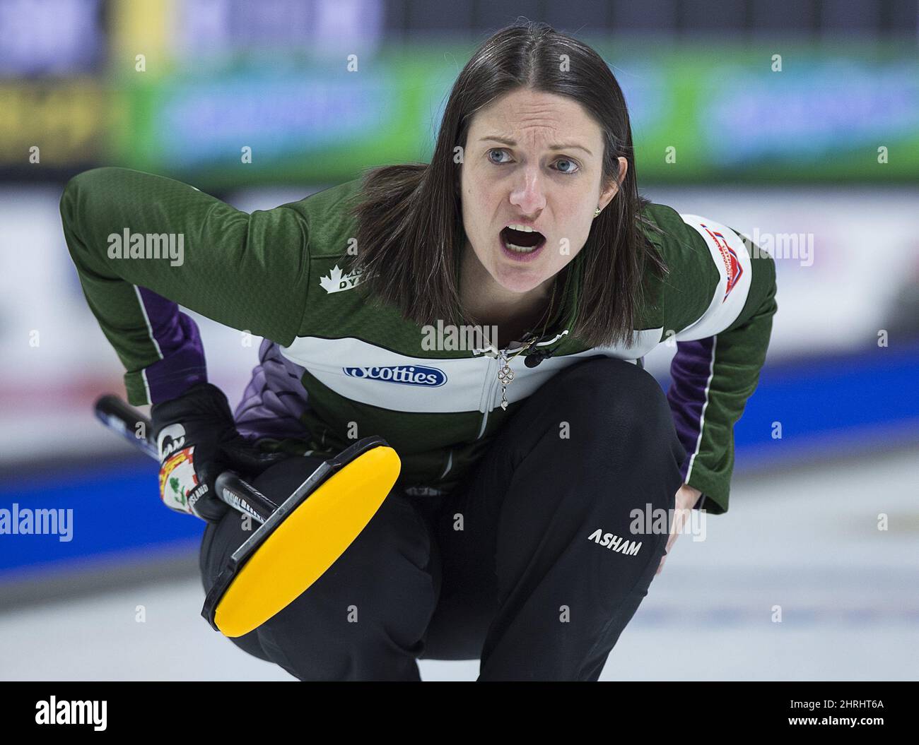 Prince Edward Island skip Suzanne Birt directs the sweep as they play ...