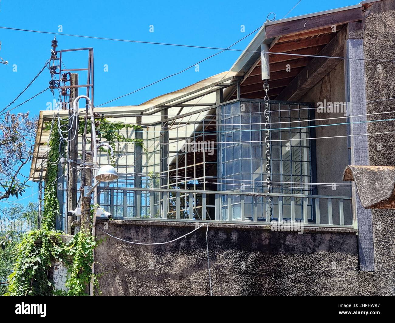 Old residential building surrounded by wires Stock Photo - Alamy