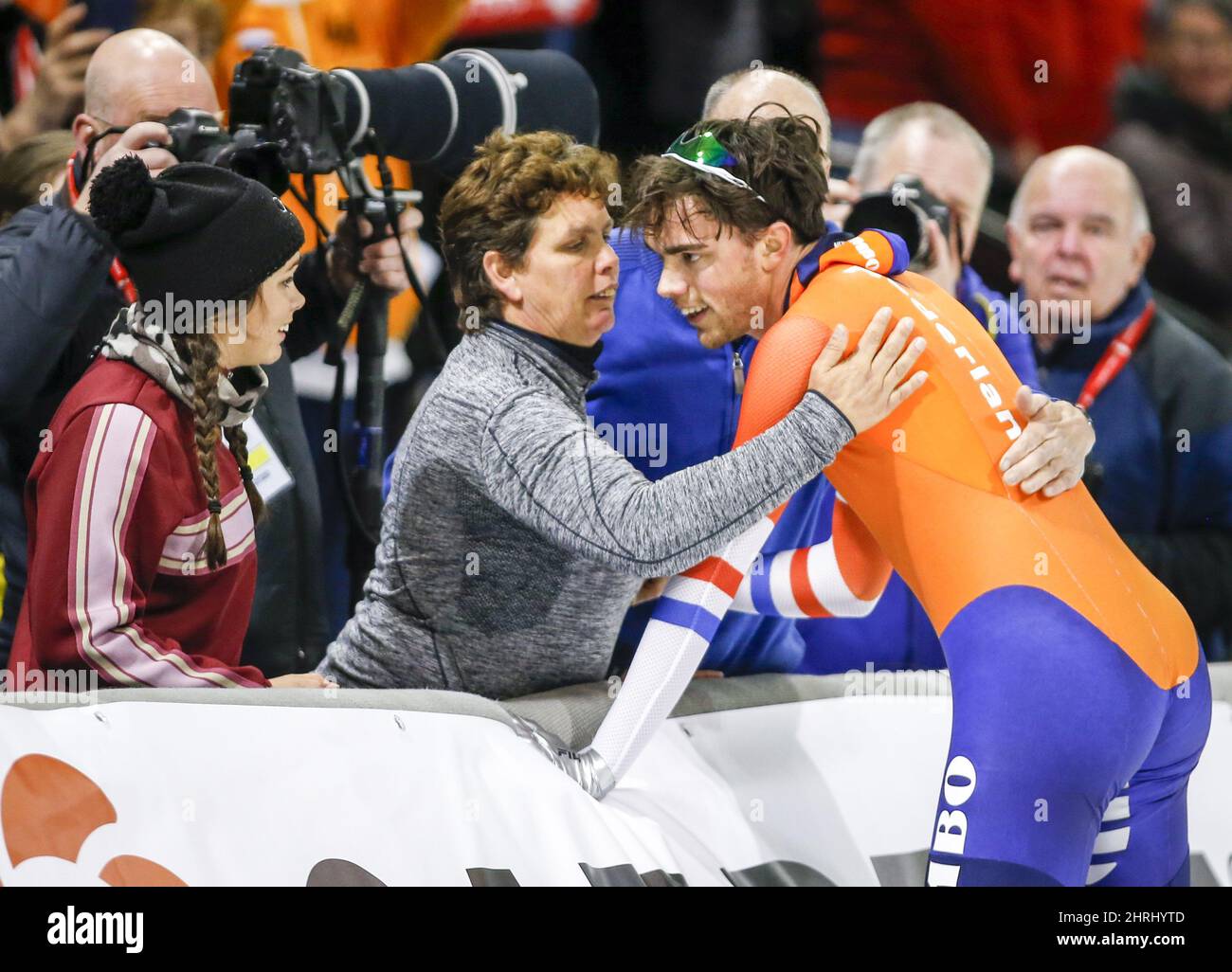 Netherland's Patrick Roest, right, celebrates winning the men's 10000 ...