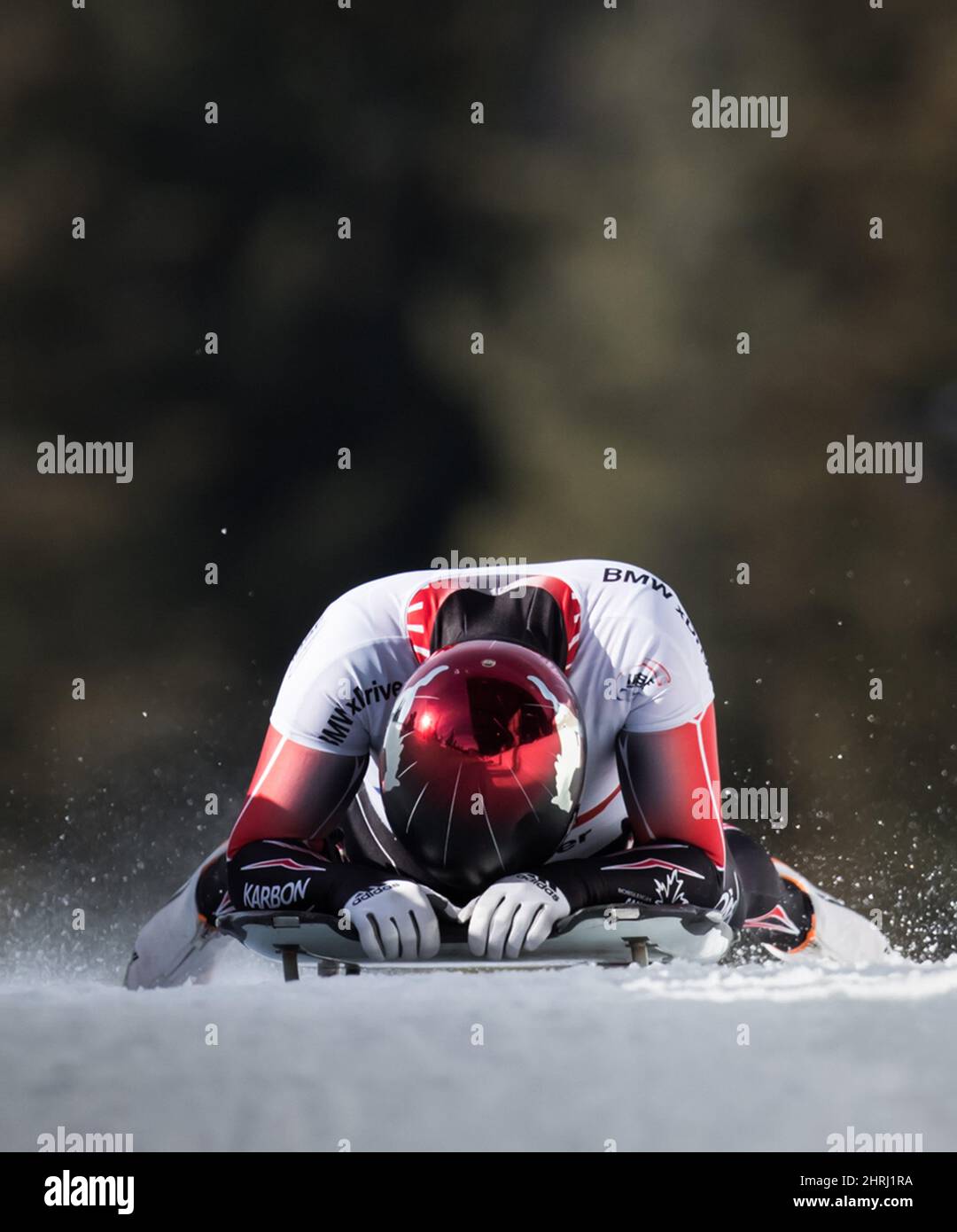 Canada's Madison Charney, of Calgary, Alta., reacts after racing to a ...