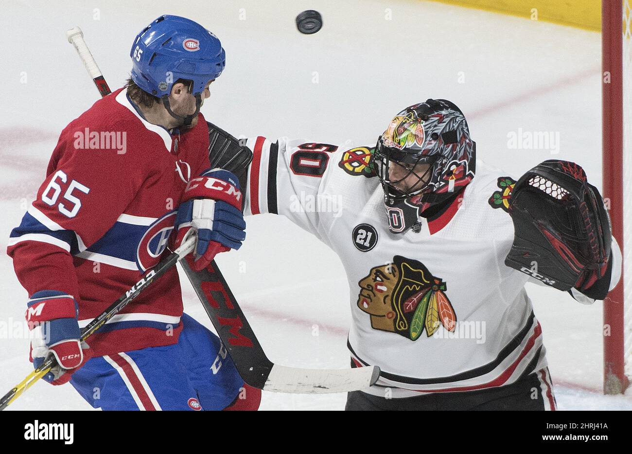 Montreal Canadiens' Andrew Shaw and Chicago Blackhawks goaltender Corey ...