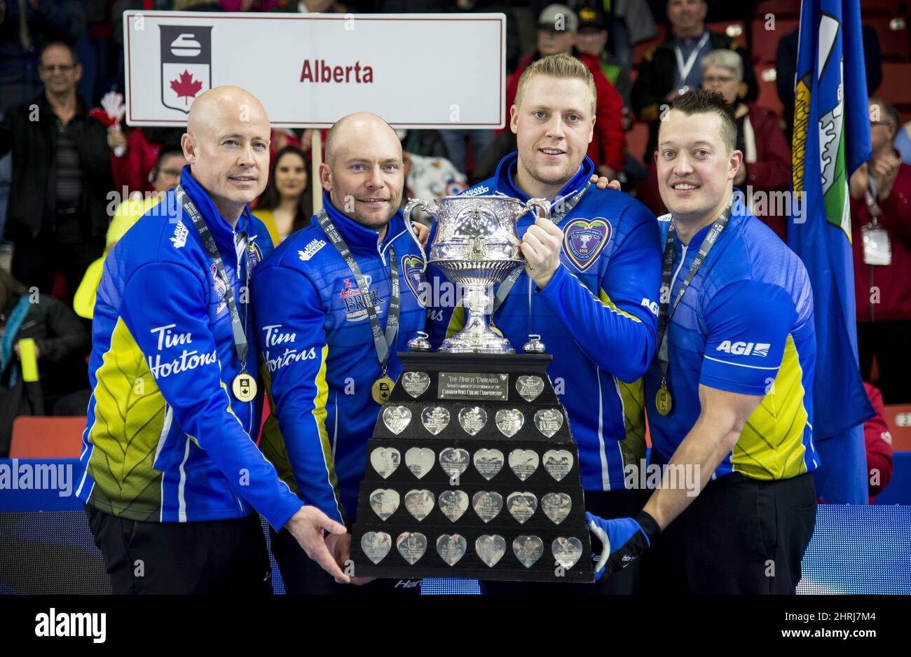 Team Alberta skip Kevin Koe (left to right), third B.J. Neufeld, second ...