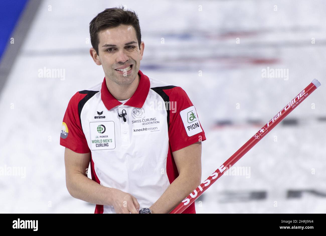Switzerland skip Peter de Cruz reacts to his shot during their game ...