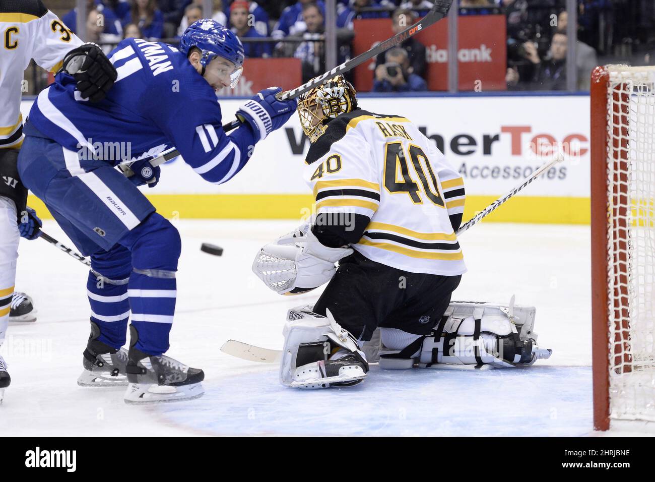 Boston Bruins goaltender Tuukka Rask (40) makes a save on a tip by ...