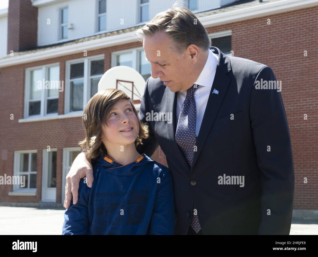 Quebec Premier Francois Legault , right, meets sixth grader student ...