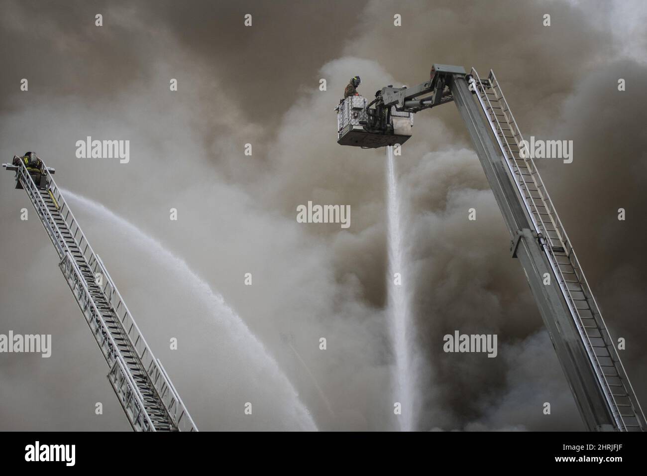 Firefighters battle a fire from above at York Memorial Collegiate ...