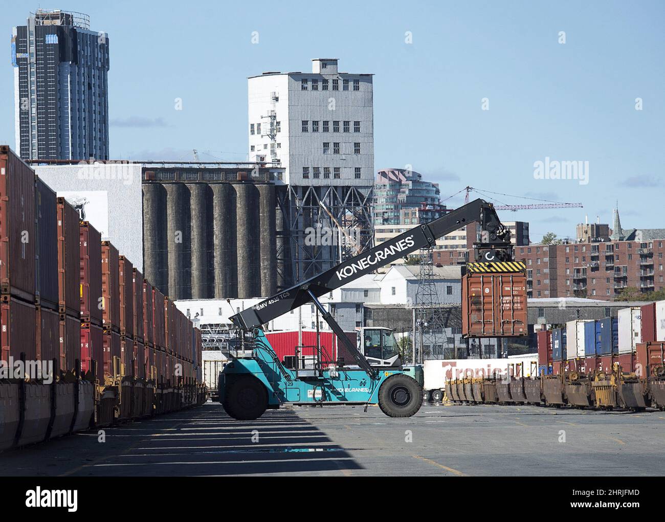 Shipping containers are moved at the Halterm Container Terminal in ...