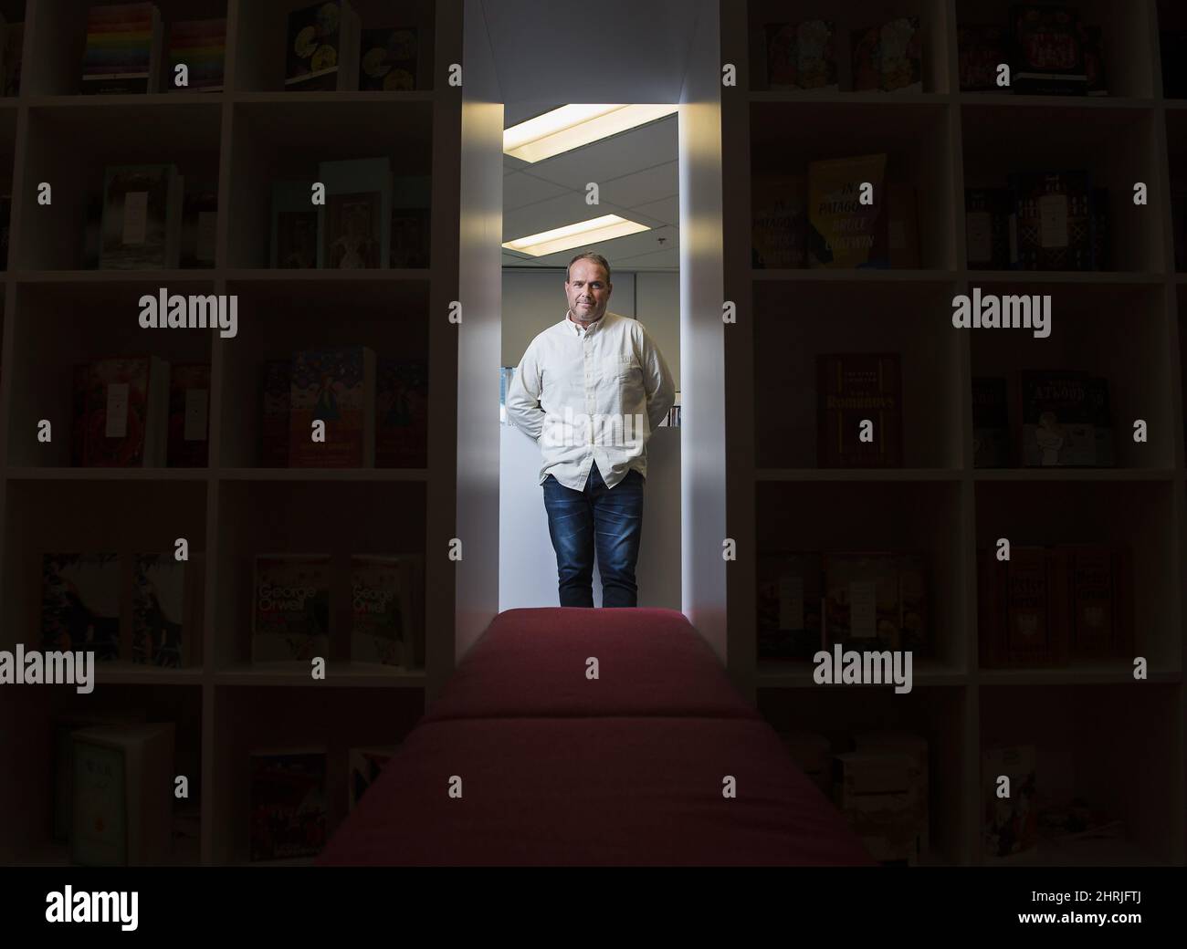Author Anthony De Sa poses for a photograph after talking about his new ...