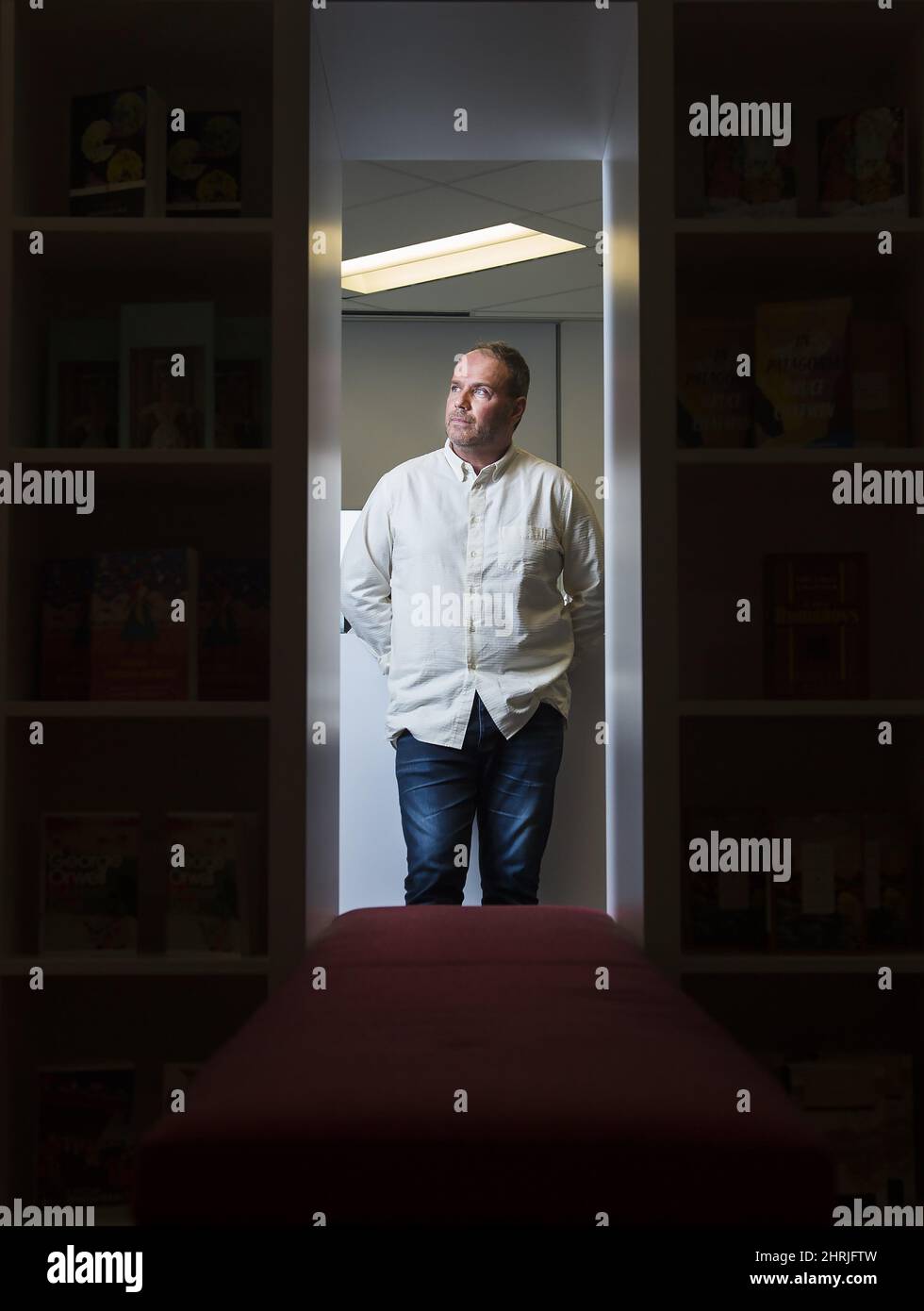 Author Anthony De Sa poses for a photograph after talking about his new ...