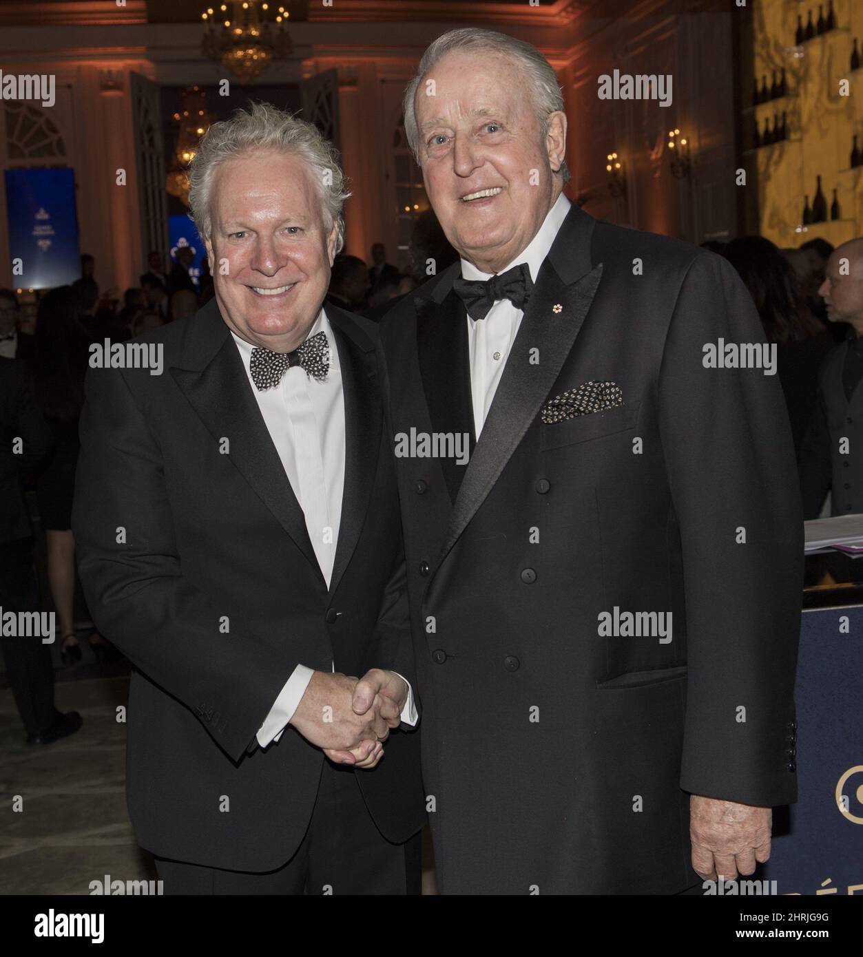 Former Prime Mininster Brian Mulroney, right, poses with former Quebec ...