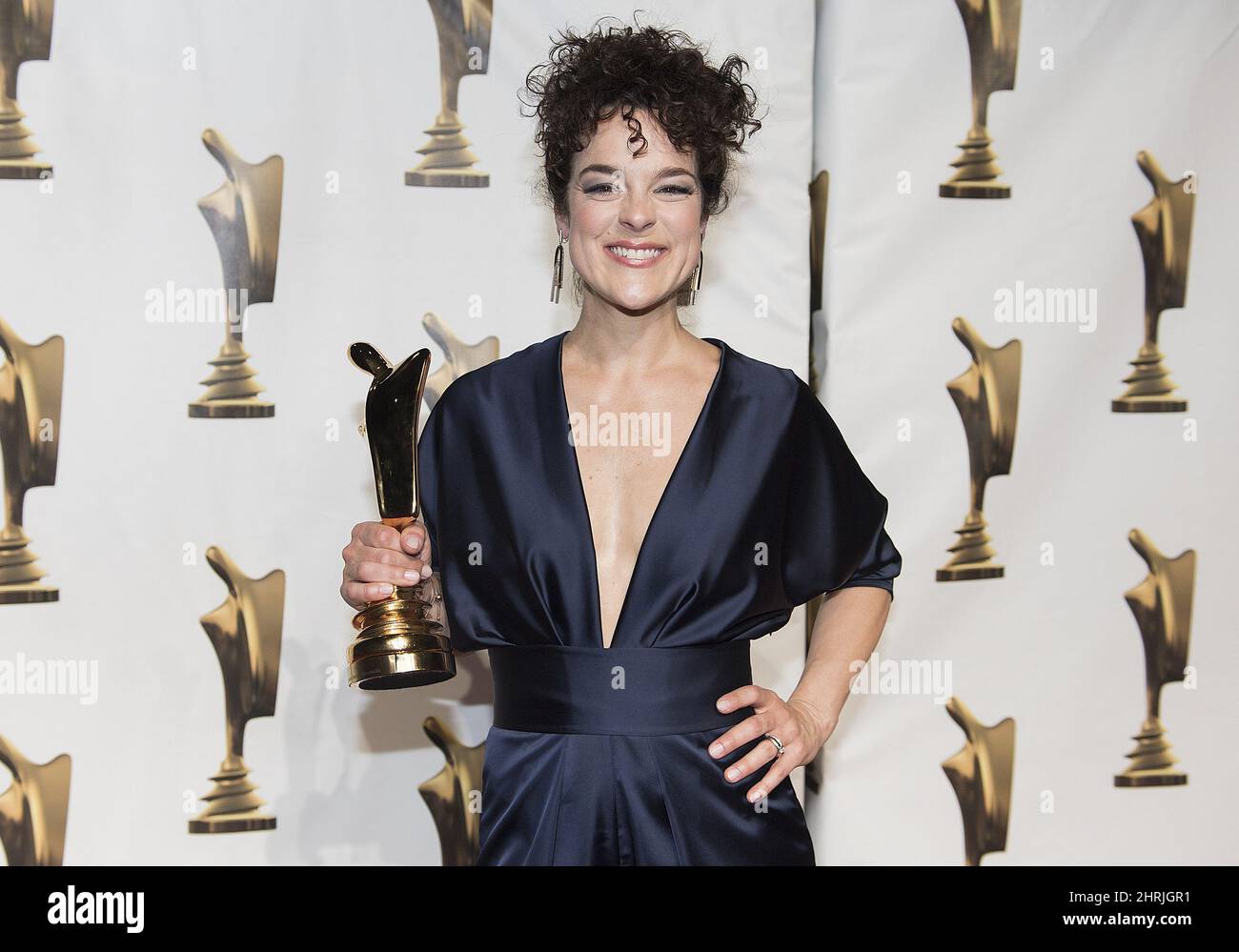 Helene Bourgeois-Leclerc holds up her trophy at the Gala Artis awards ...