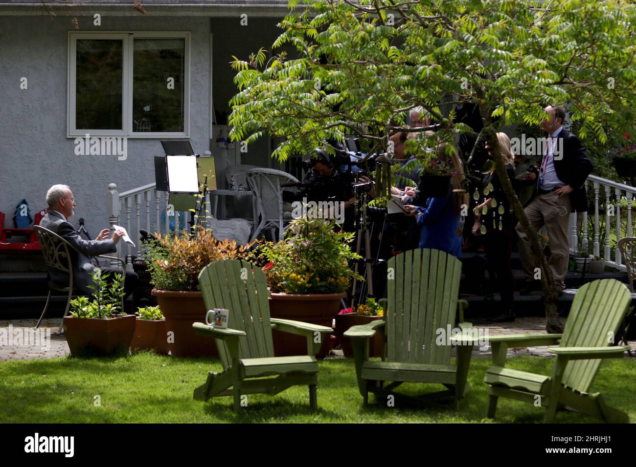 Suspended Sgt-at-arms Gary Lenz gives an interview from his backyard ...