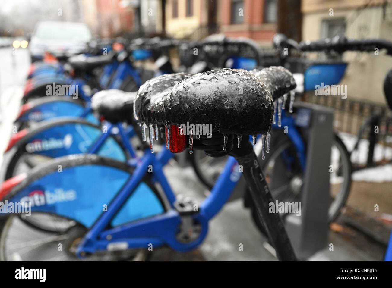Icicles form on the seat of a Citibike as cold weather causes icing on ...