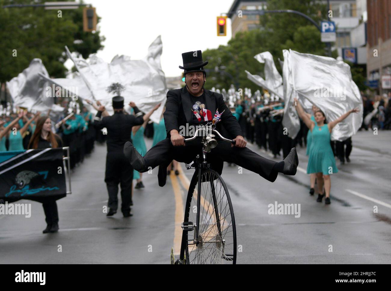 People line up to see the many floats, marching bands and cultural ...