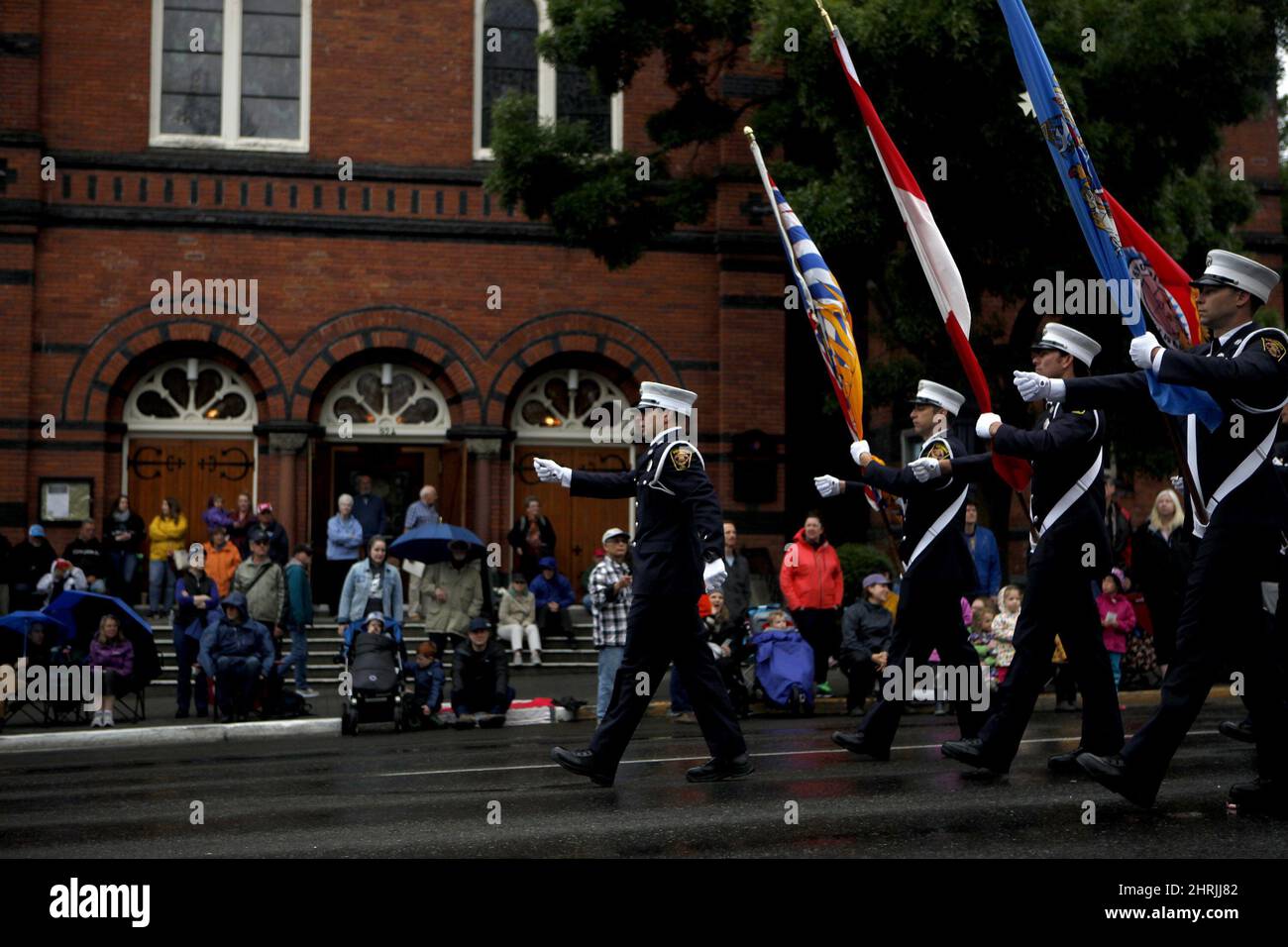 People line up to see the many floats, marching bands and cultural ...