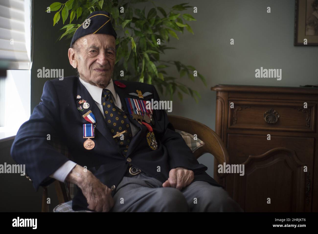 D-Day veteran Martin Maxwell poses for a photograph at his home in ...