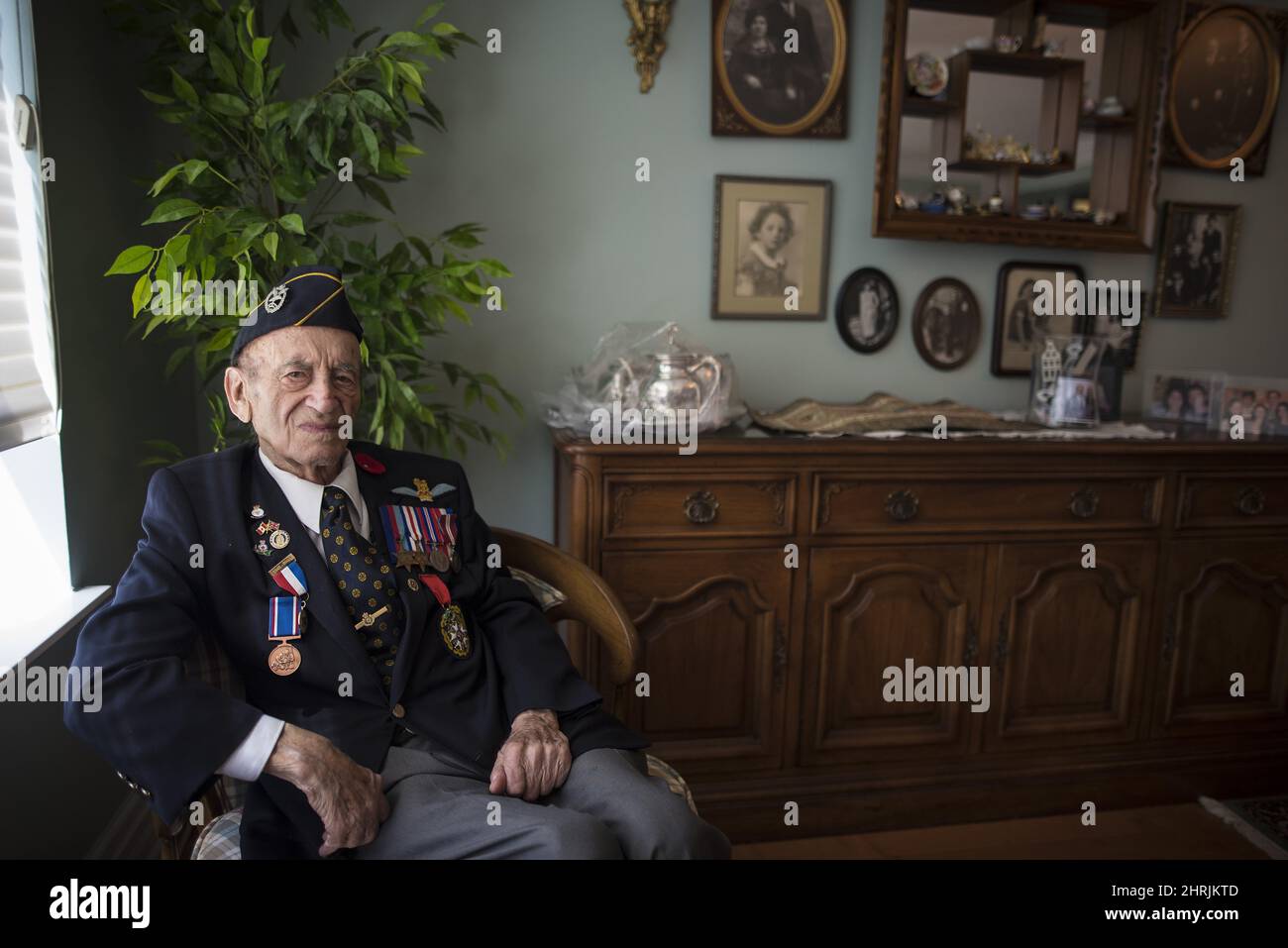 D-Day veteran Martin Maxwell poses for a photograph at his home in ...