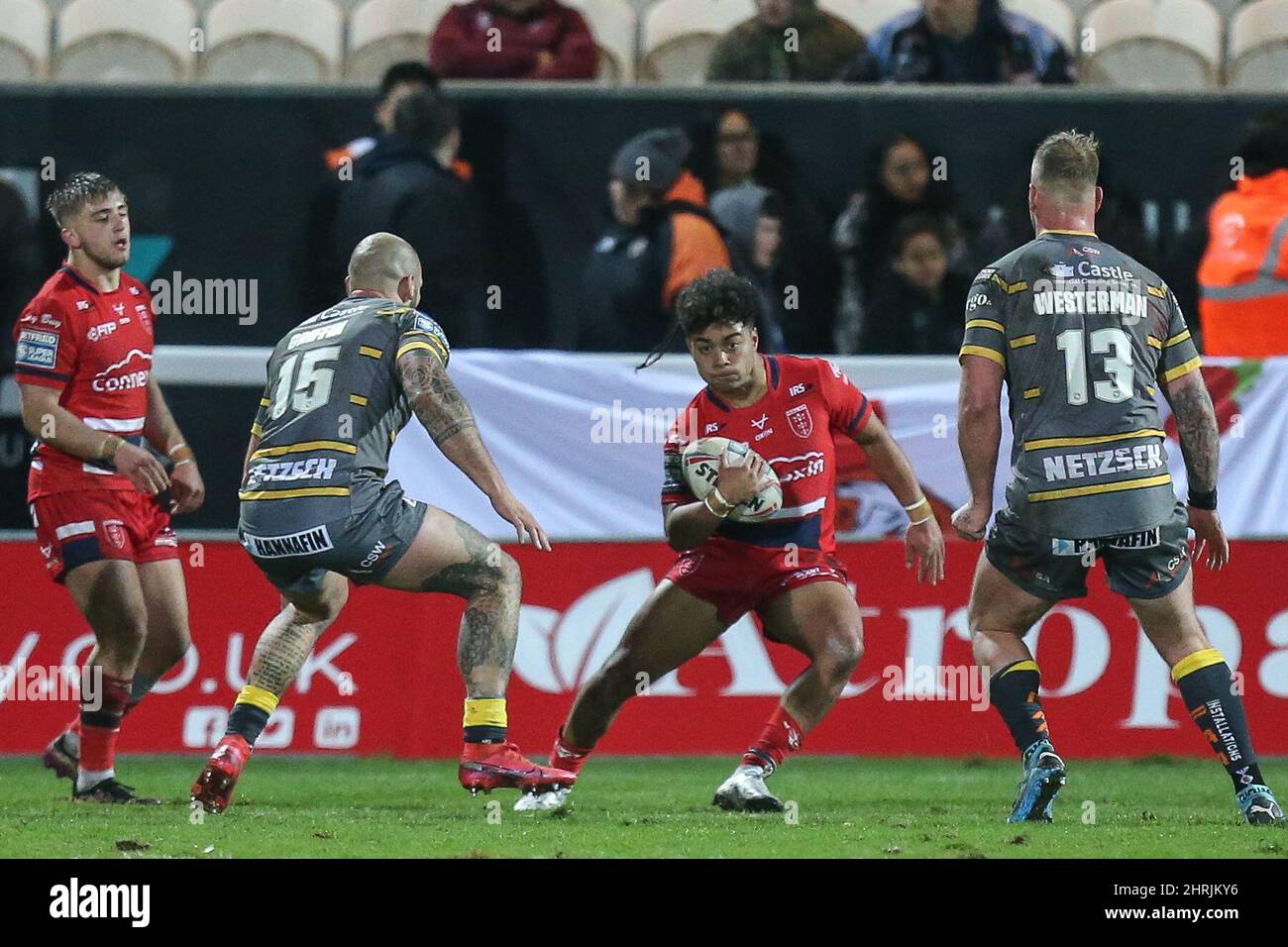 Phoenix Laulu-Togaga'e #29 of Hull KR runs at the Castleford defence ...