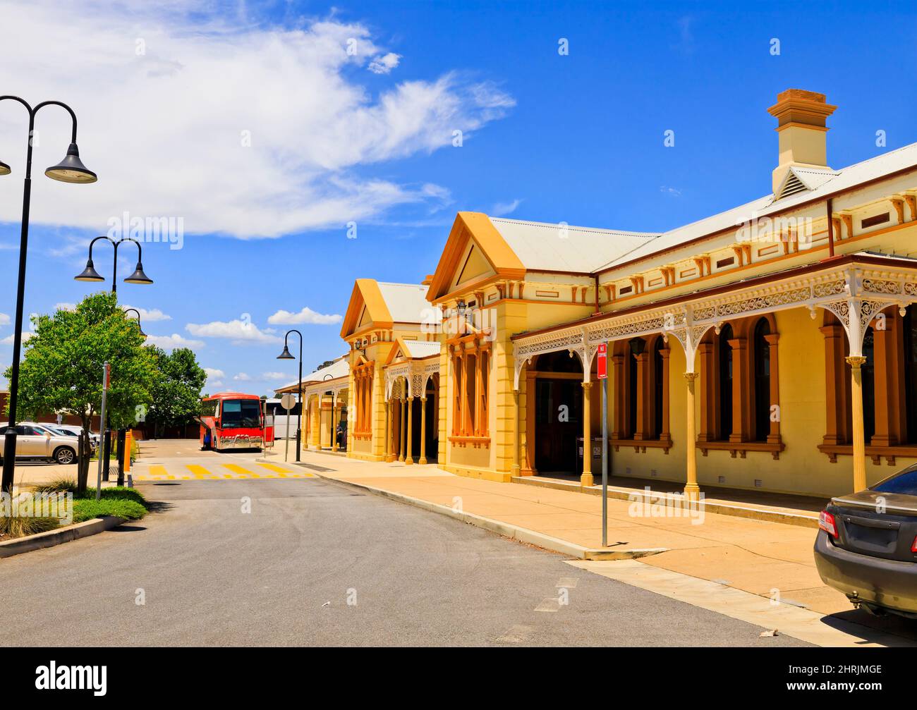 Wagga Wagga city train station facade from entrance square with car ...