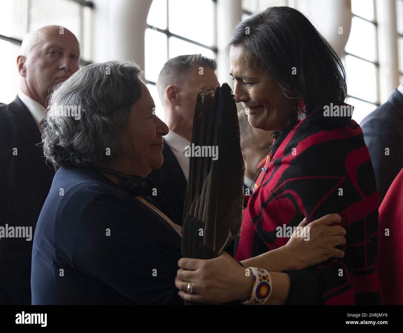 Commissioner Michele Audette speaks with a women during ceremonies ...