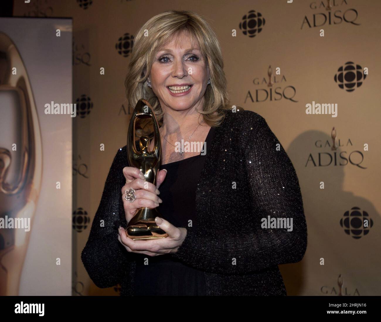 Country signer Renee Martel holds up her honorary Felix at the Adisq ...