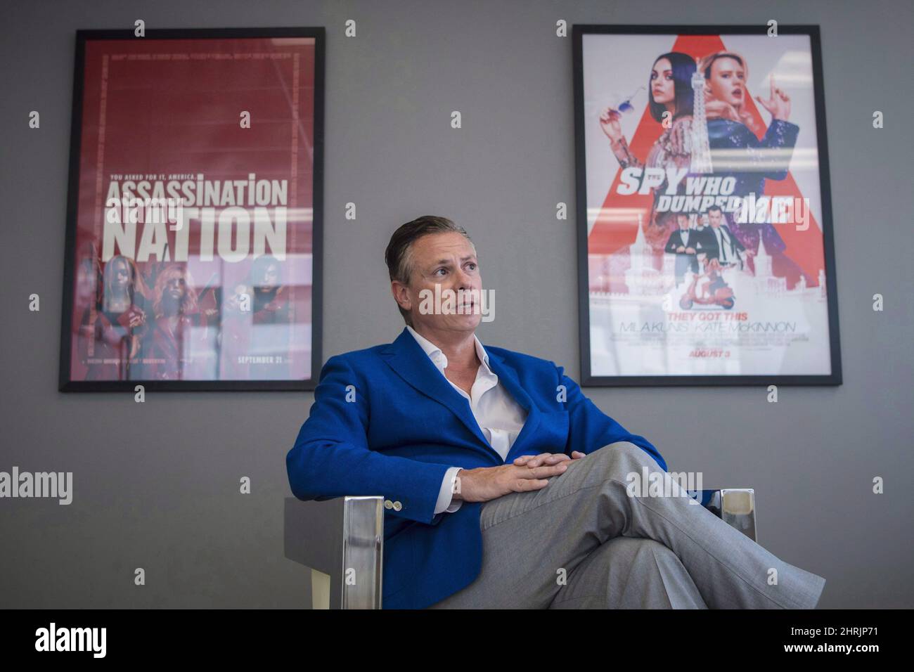 Jason Cloth, head of Toronto-based Creative Wealth Media, chats with a ...