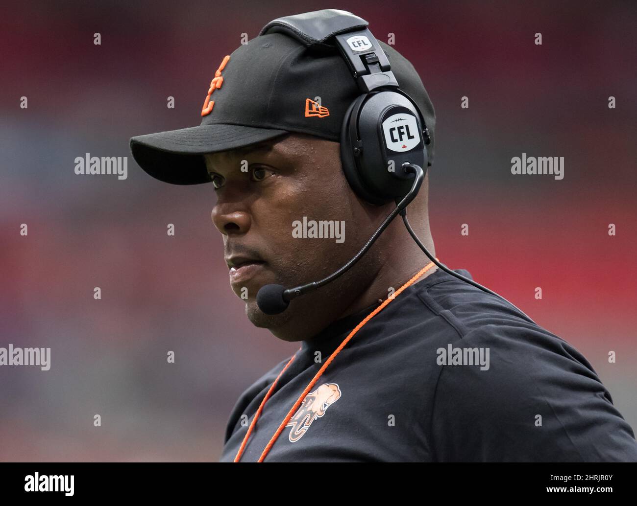 B.C. Lions head coach DeVone Claybrooks stands on the sideline during ...