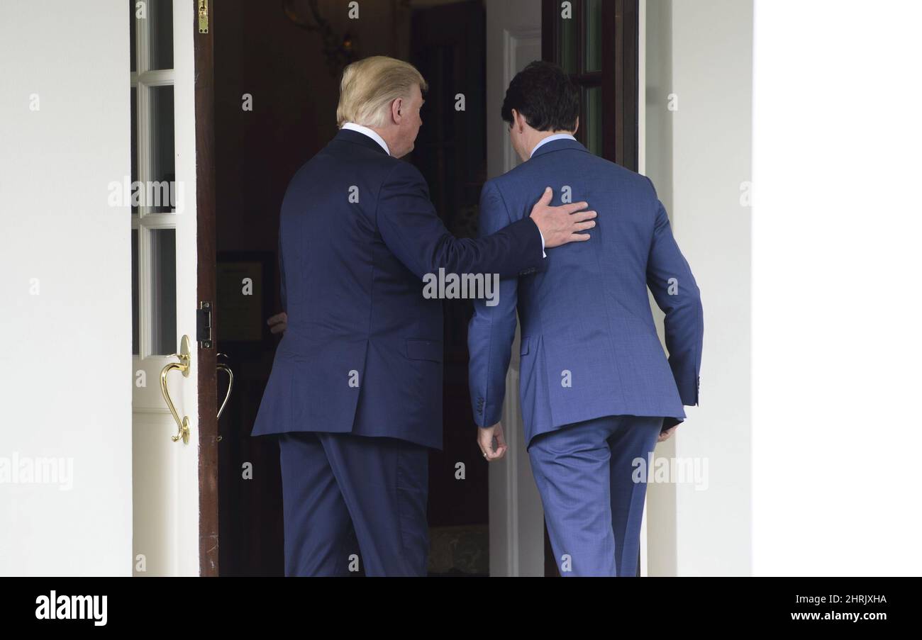 Prime Minister Justin Trudeau is greeted by U.S. President Donald Trump ...