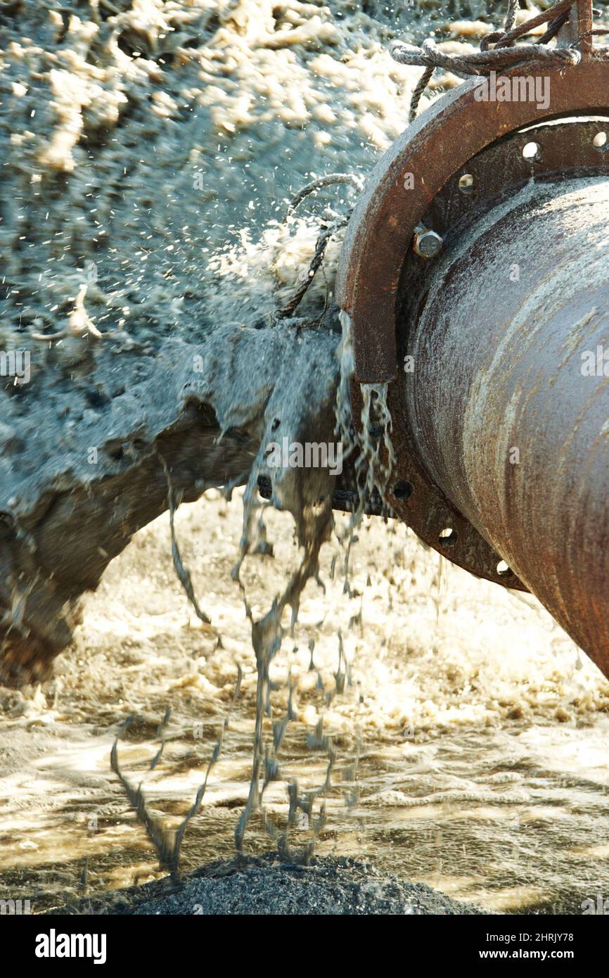 Polluted water flowing out of pipe hi-res stock photography and images ...
