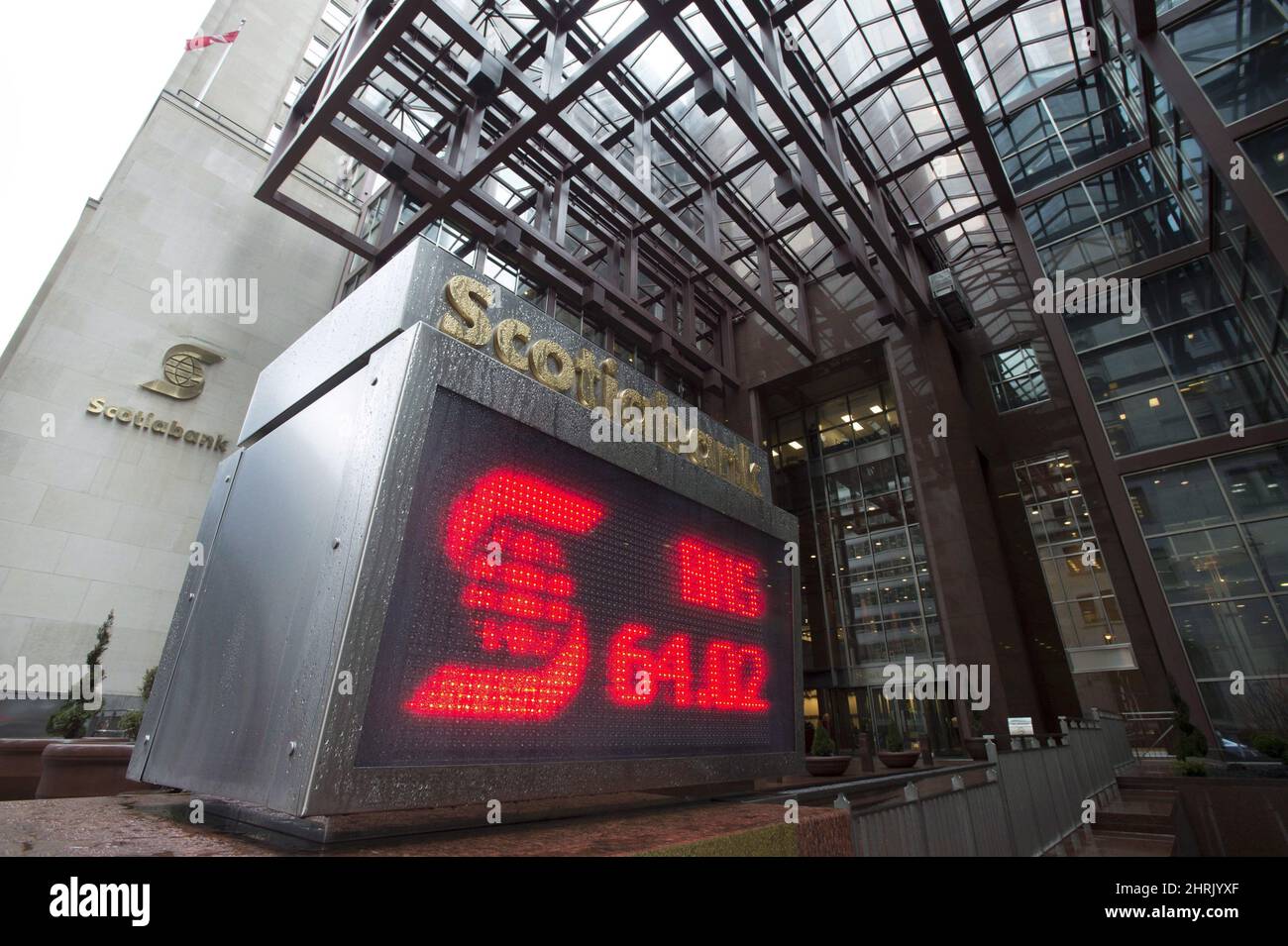 An electronic sign posting financial data is shown outside the ...