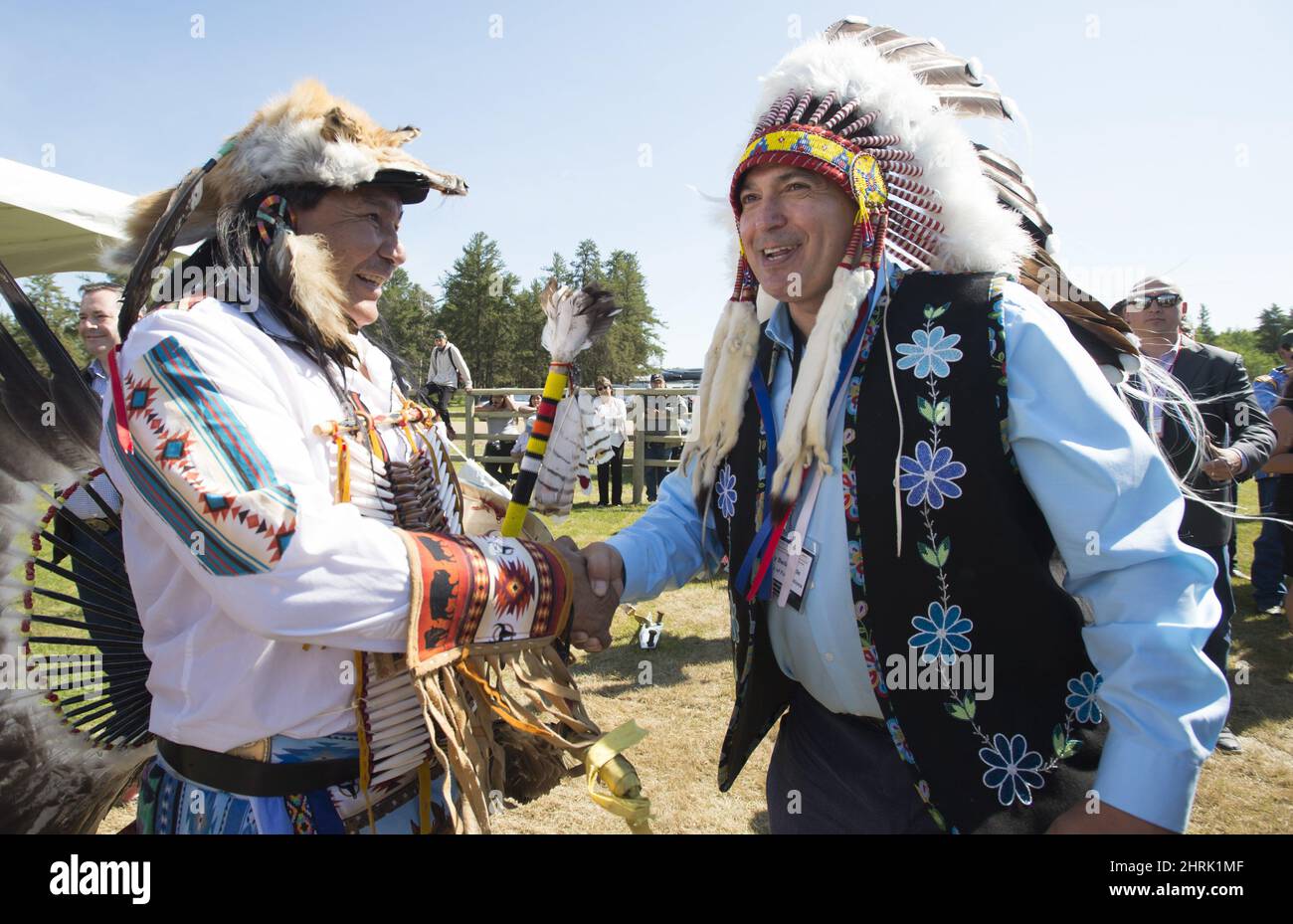 Assembly of First Nations Chief Perry Bellegarde shakes hands with ...