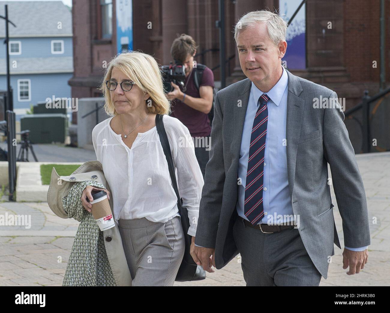 Dennis Oland and his wife Lisa arrive at the Law Courts in Saint John ...
