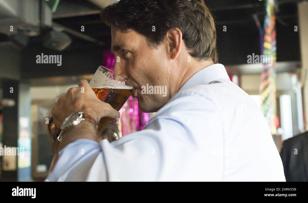 Prime Minister Justin Trudeau takes a sip of a pint of beer during a ...