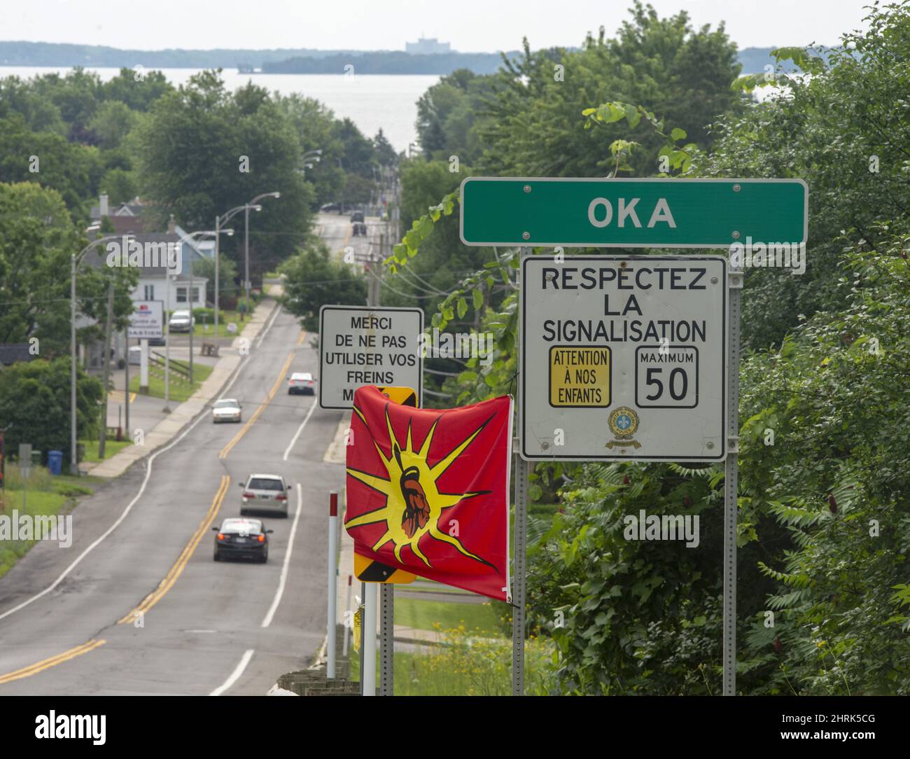 Mohawk flags are placed at the border of the Kanasatake Mohawk ...