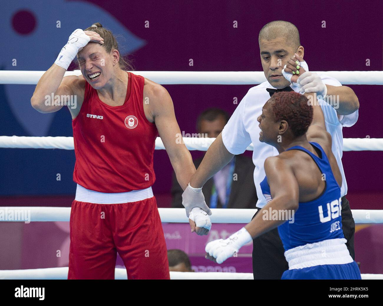 Canada's Myriam Da Silva, left, from Chambly, Que. reacts after losing ...