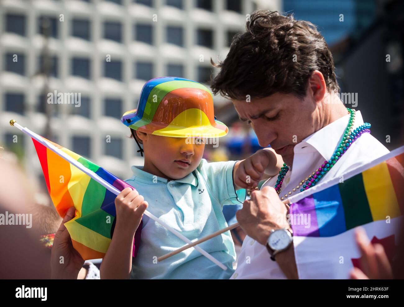 Prime Minister Justin Trudeau's youngest son, Hadrien, 5, reaches for a ...