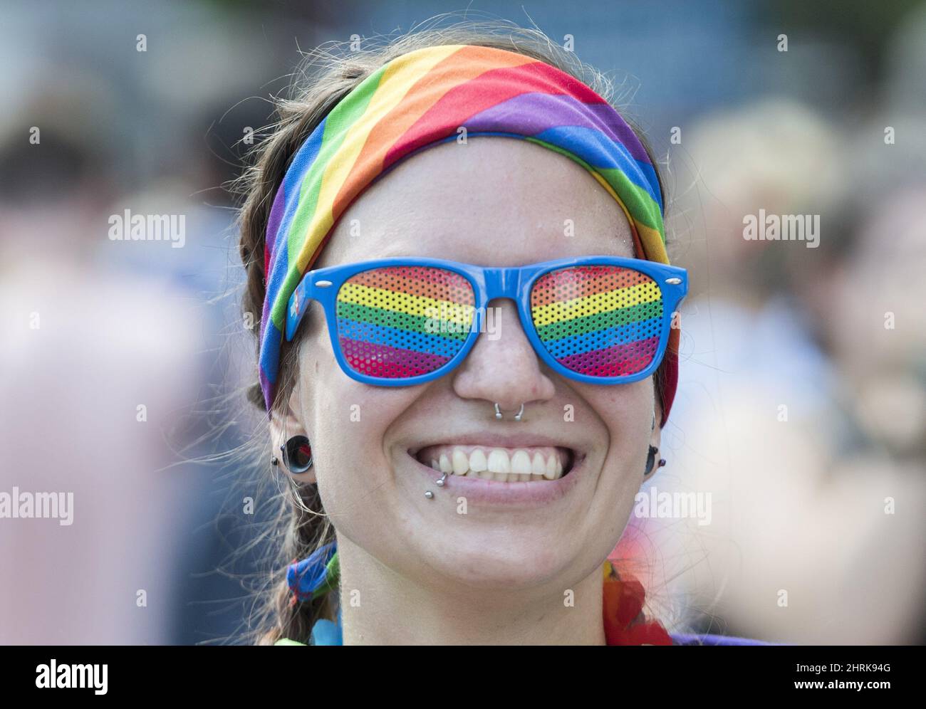 A woman smiles during annual pride parade in Montreal, Que. Sunday ...