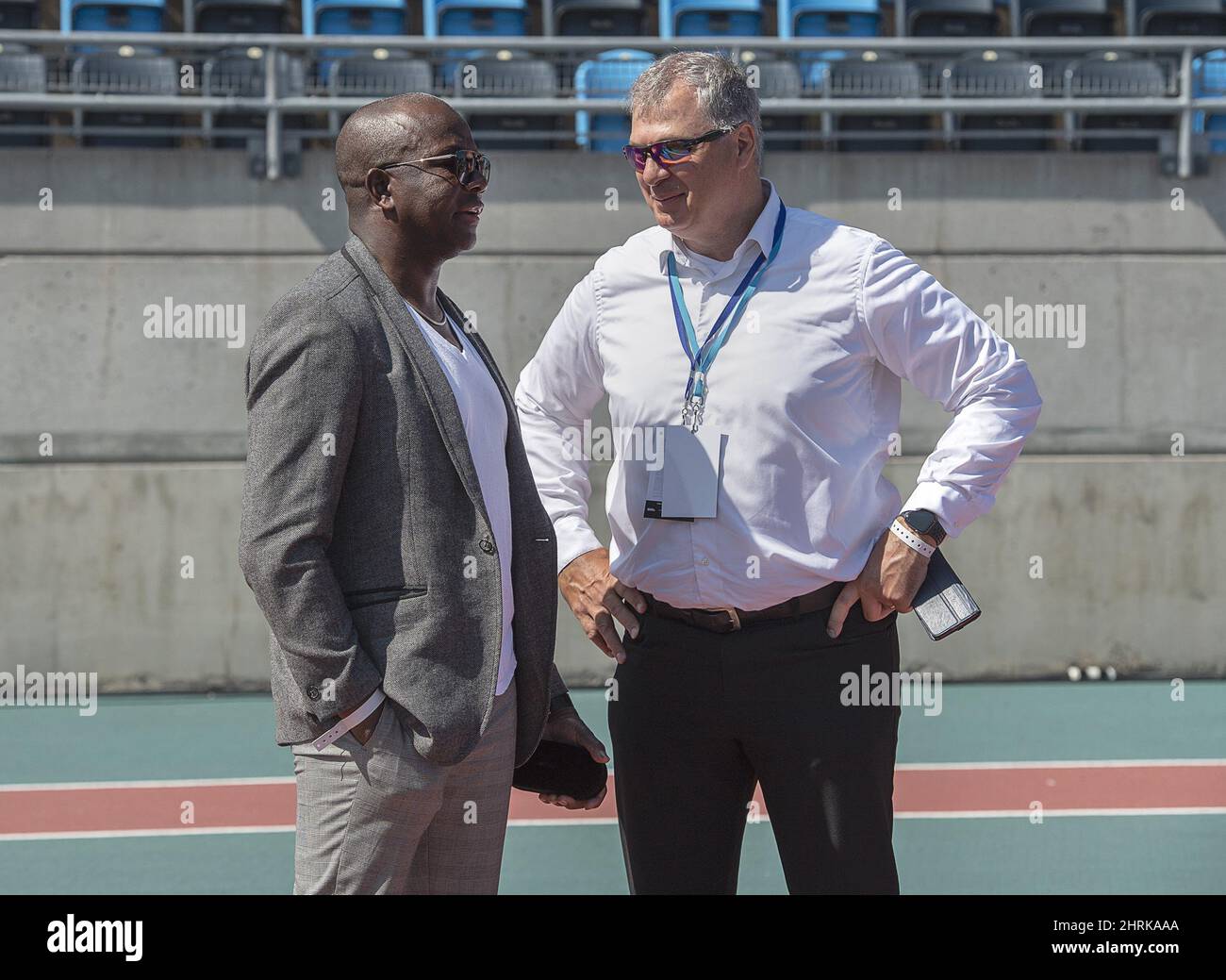 Randy Ambroise, commissioner of the Canadian Football League, chats ...