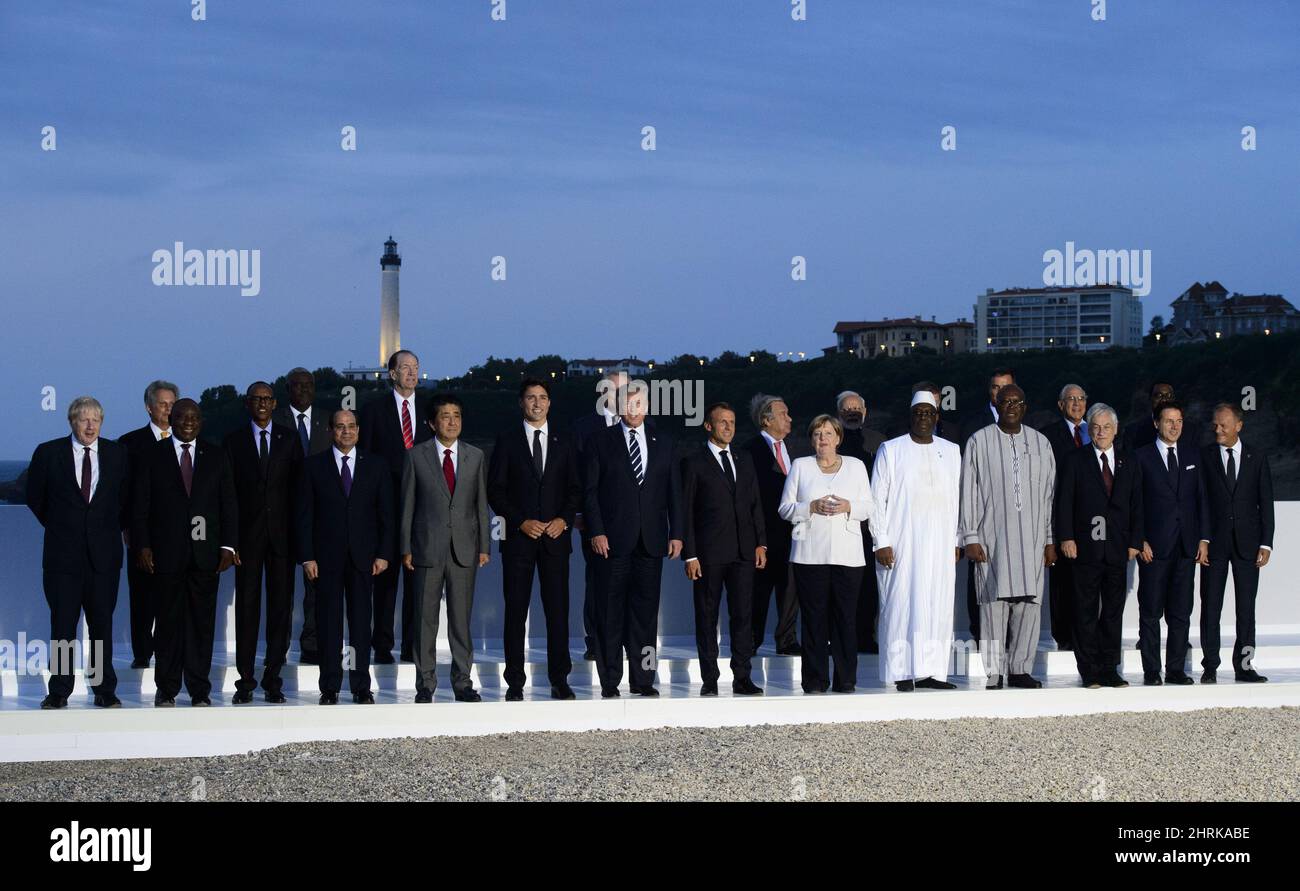 Prime Minister Justin Trudeau takes part in an expanded family photo at ...