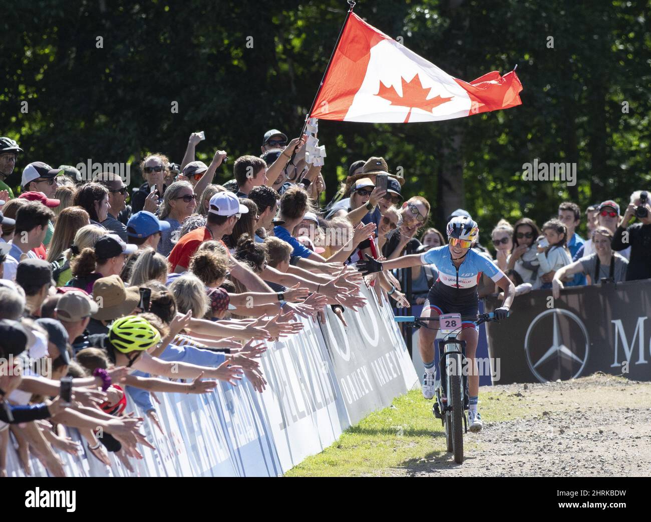 Top Canadian Emily Batty of Oshawa Ont. celebrates as she cycles to the ...