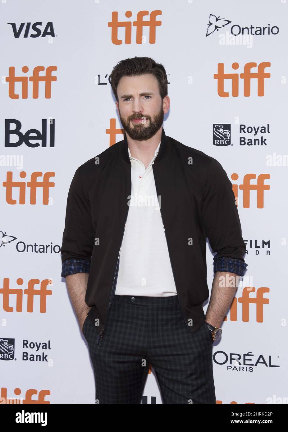 Actor Chris Evans poses for photographs on the red carpet for the new ...