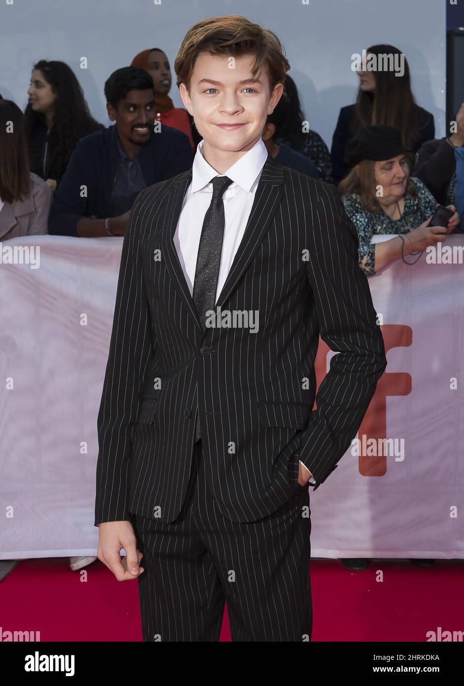 Actor Oakes Fegley arrives on the red carpet for the gala premiere of ...