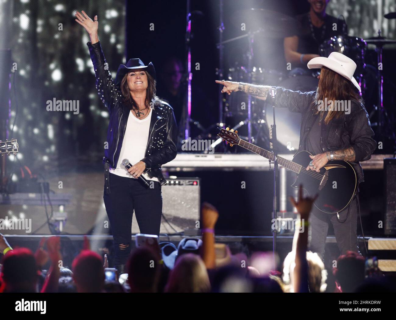 Terri Clark, left, and Billy Ray Cyrus salute the crowd at the Canadian ...