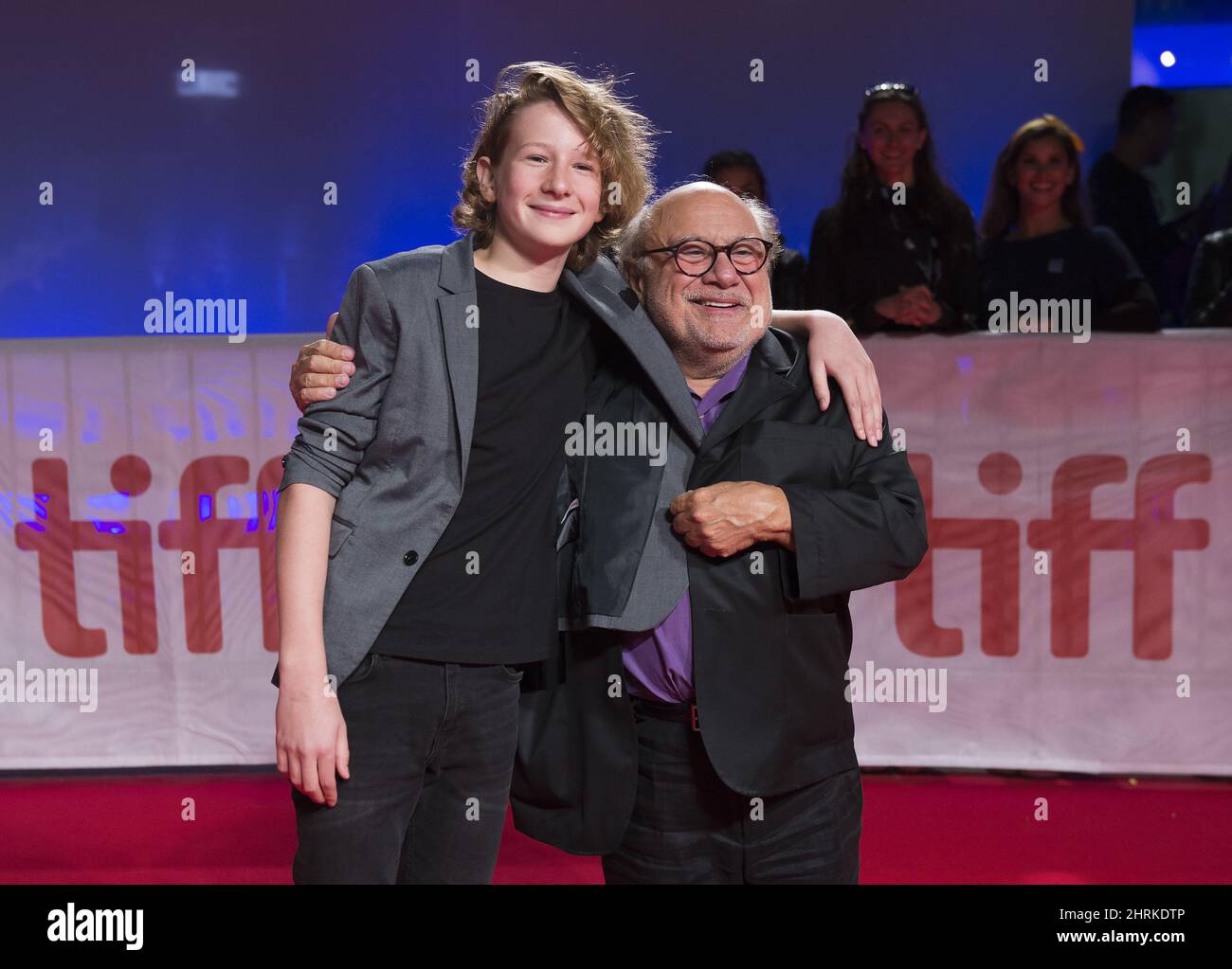 Actors Misha Handley, left, and Danny DeVito arrive on the red carpet ...