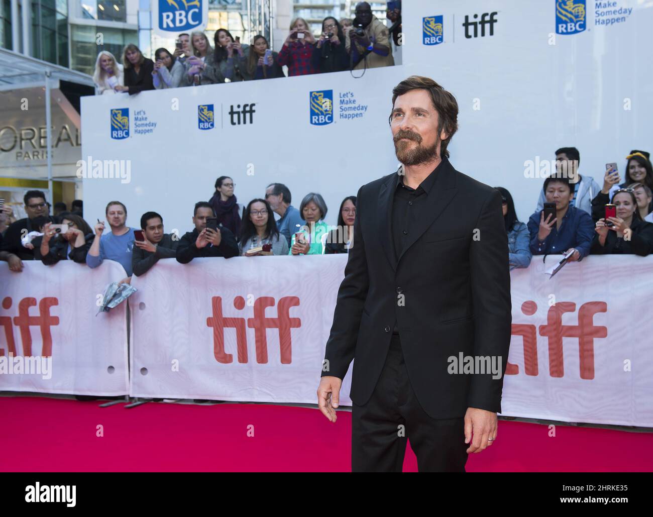 Actor Christian Bale arrives on the red carpet for the gala premiere of ...